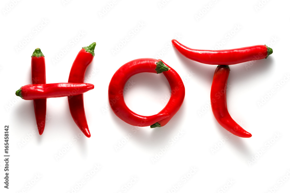 Hot word made from red hot chili pepper on white background Stock Photo ...