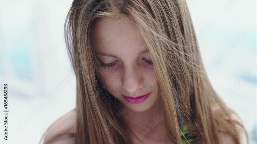 Young Shy Girl becoming Happy Stock Video | Adobe Stock