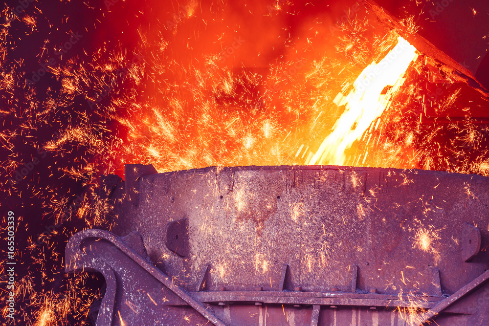 Liquid metal from blast furnace in the steel plant,industry landscape ...