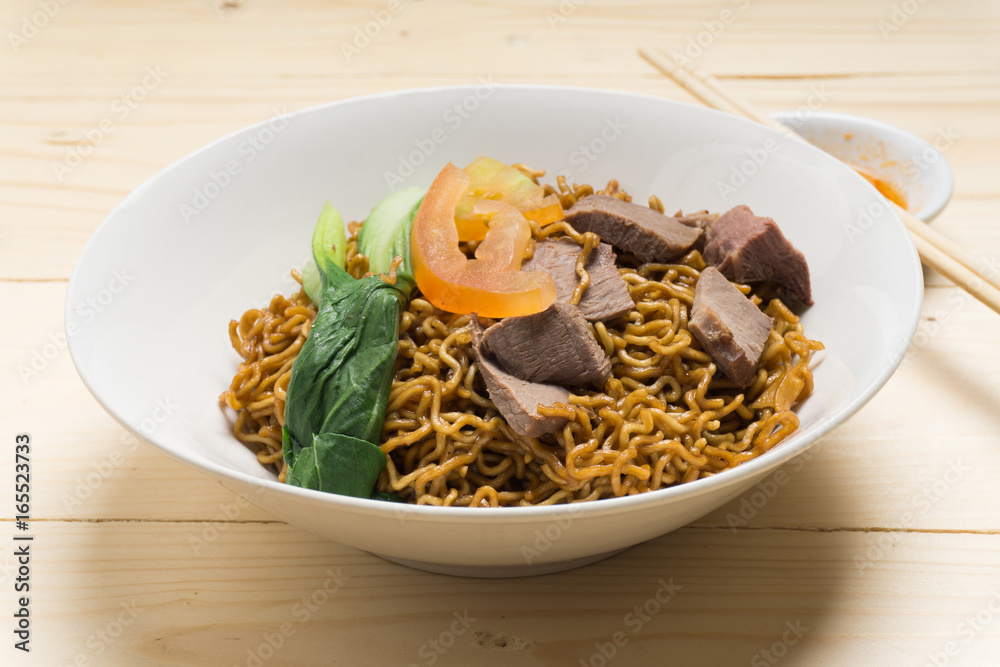 Local cuisine Kolo Mee or Mee Kolok in Sarawak, Malaysia. Stock Photo ...
