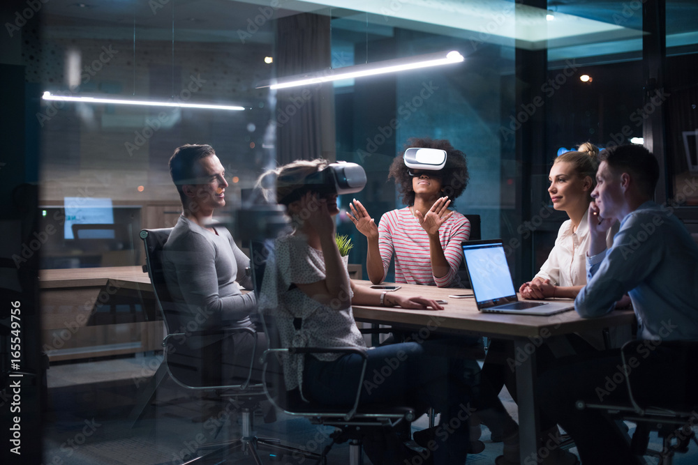 Multiethnic Business team using virtual reality headset Stock Photo ...