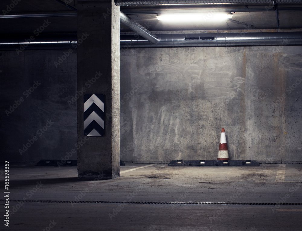 Urban underground background. Concrete wall under the lamp light in the ...