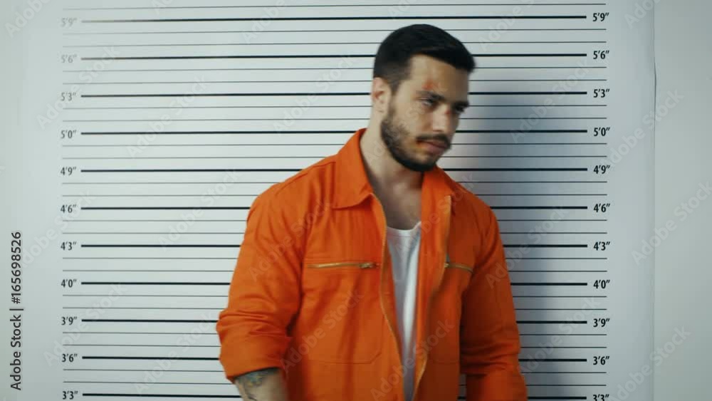 In a Police Station Arrested Man Getting Side, Front-View Mug Shot. He ...