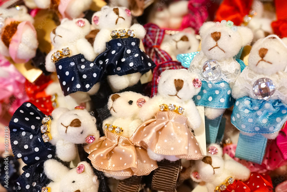 pile of teddy bears in beautiful dress, lady hair accessories (teddy ...