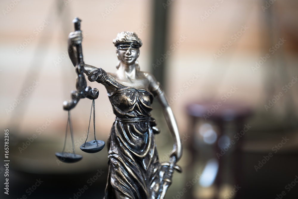 Symbols for balance and power in law and court, selected focus, narrow ...