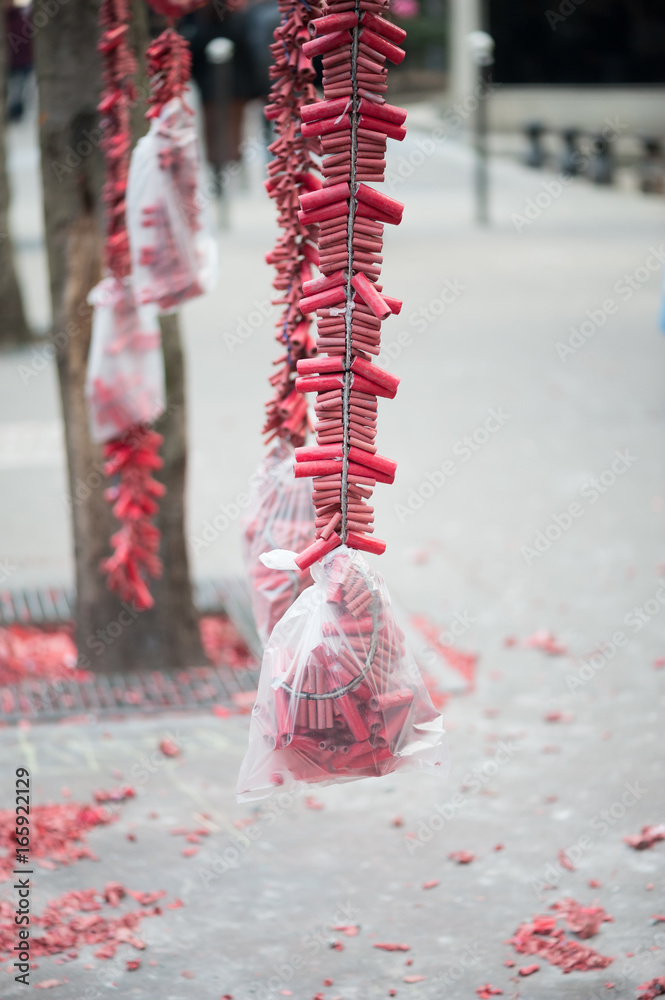 firecrackers hanging on a tree for the chinese new year Stock Photo ...