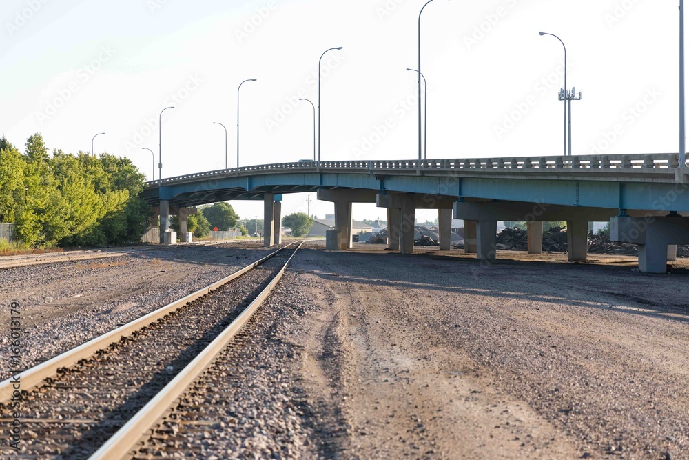 Bridge over train tracks - multiple modes of transportation Stock Photo ...