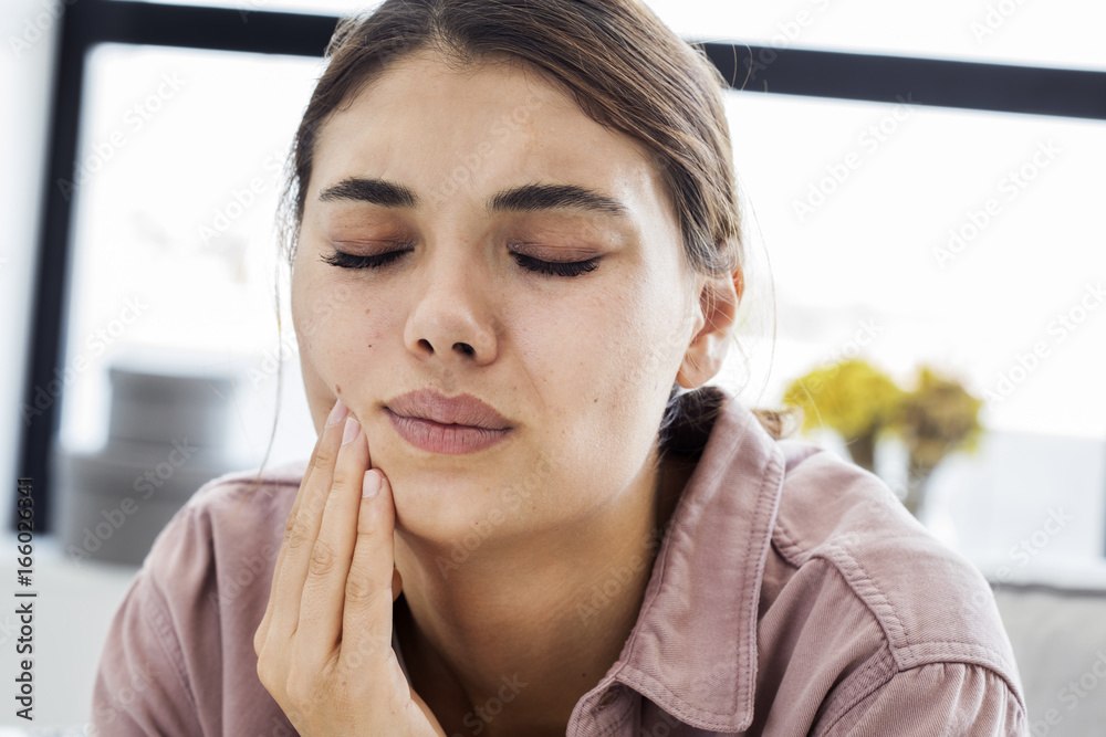 Young woman with toothache Stock Photo | Adobe Stock