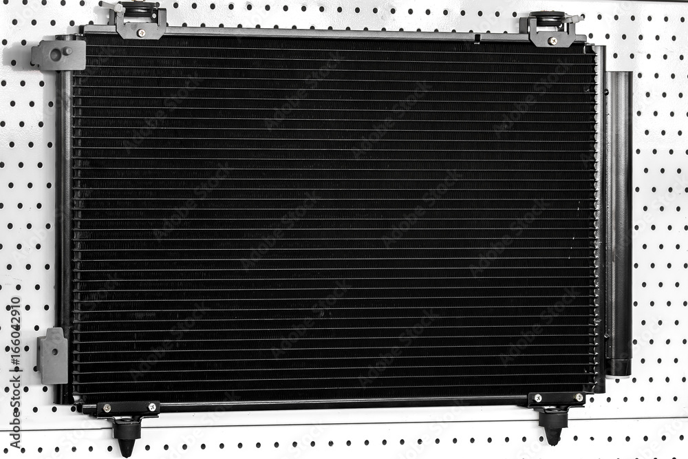 Engine cooling radiator. Stock Photo | Adobe Stock