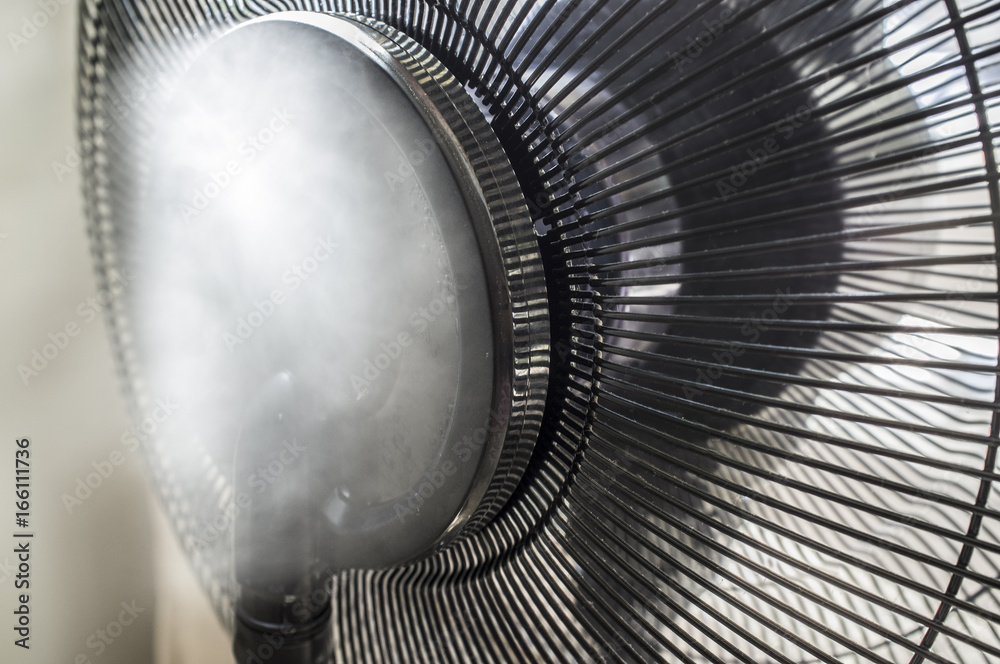Water Vapour Mist Fan splashing vaporized water Stock Photo | Adobe Stock