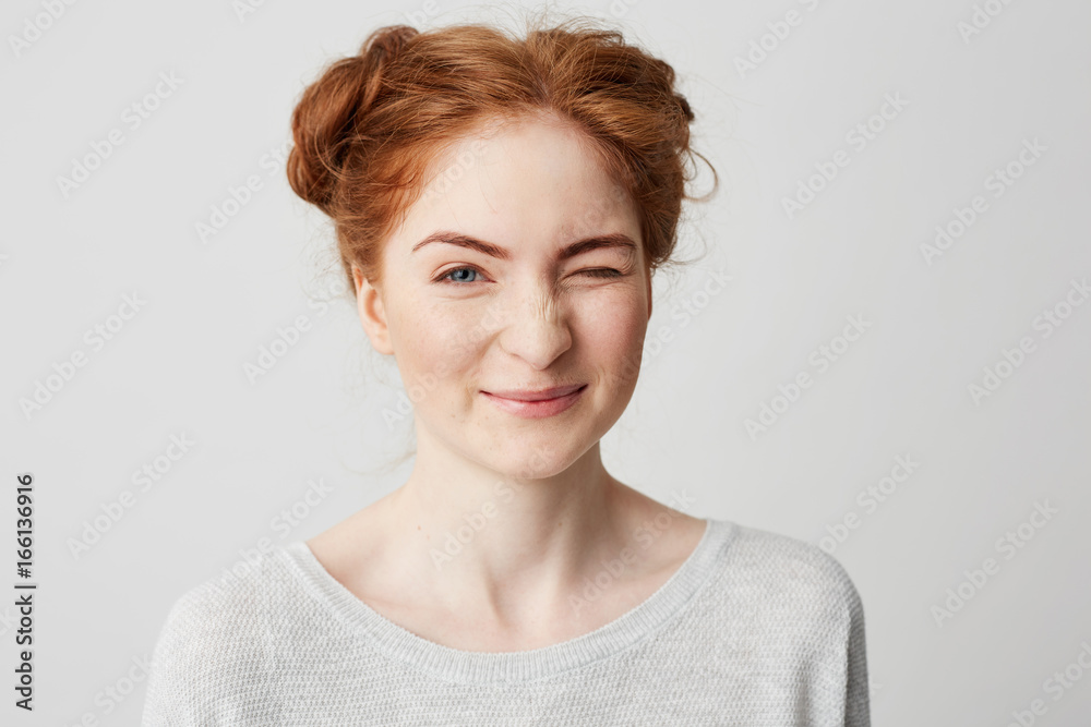 Close Up Of Young Cute Redhead Girl Smiling Looking At Camera Winking