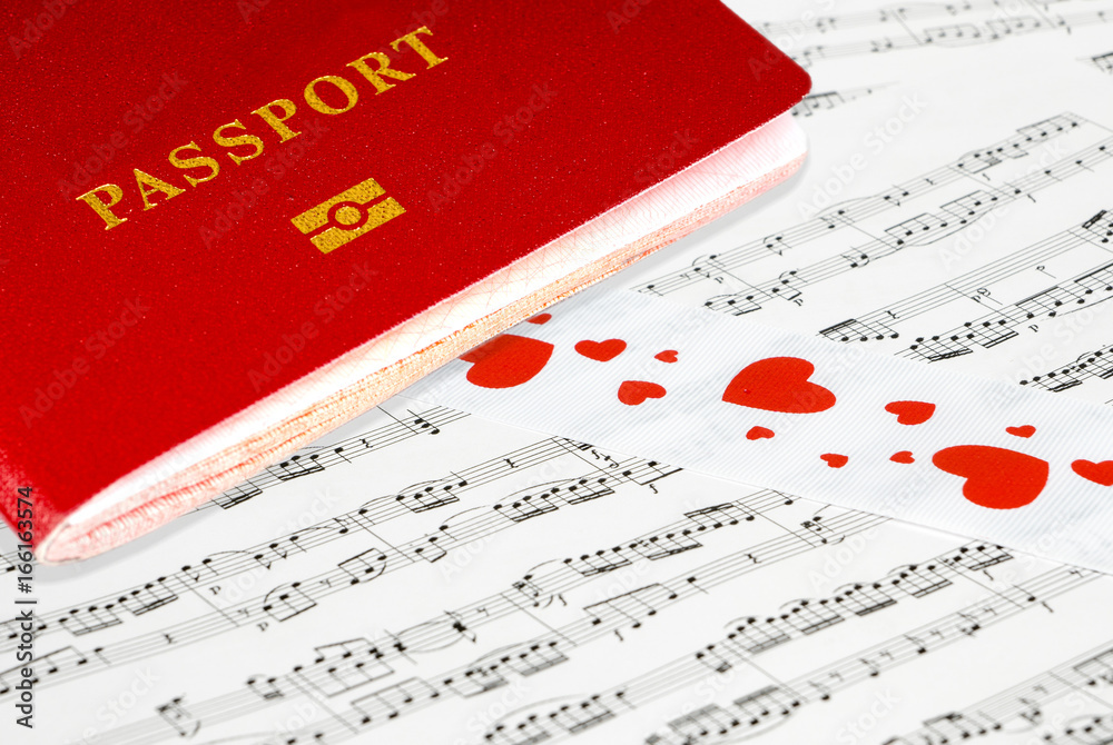 passport over music sheets Stock Photo | Adobe Stock
