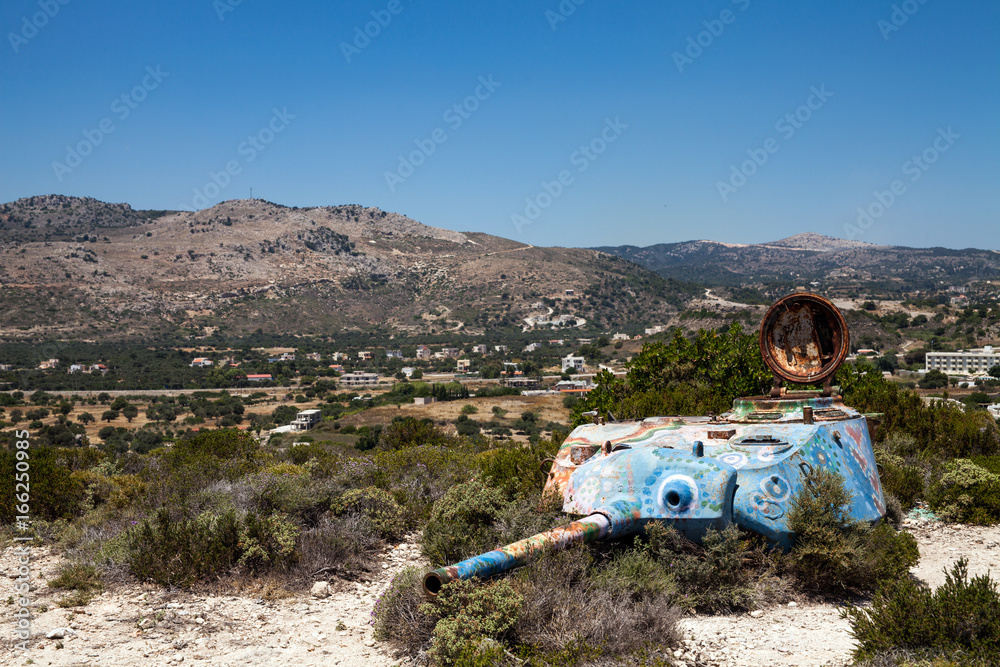 Destroyed tank on the hill. Old upper part of the tank remains after ...