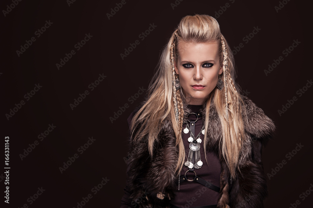 Portrait of viking woman in a traditional warrior clothes. Stock Photo ...