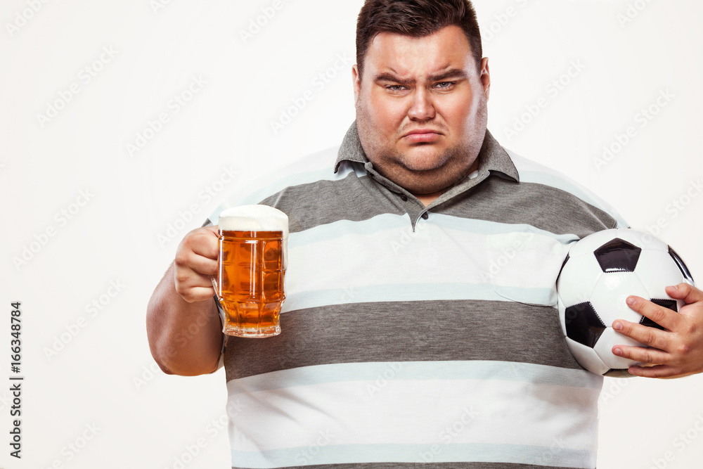 Soccer fun - fat man at oktoberfest, drinking beer isolated on white ...