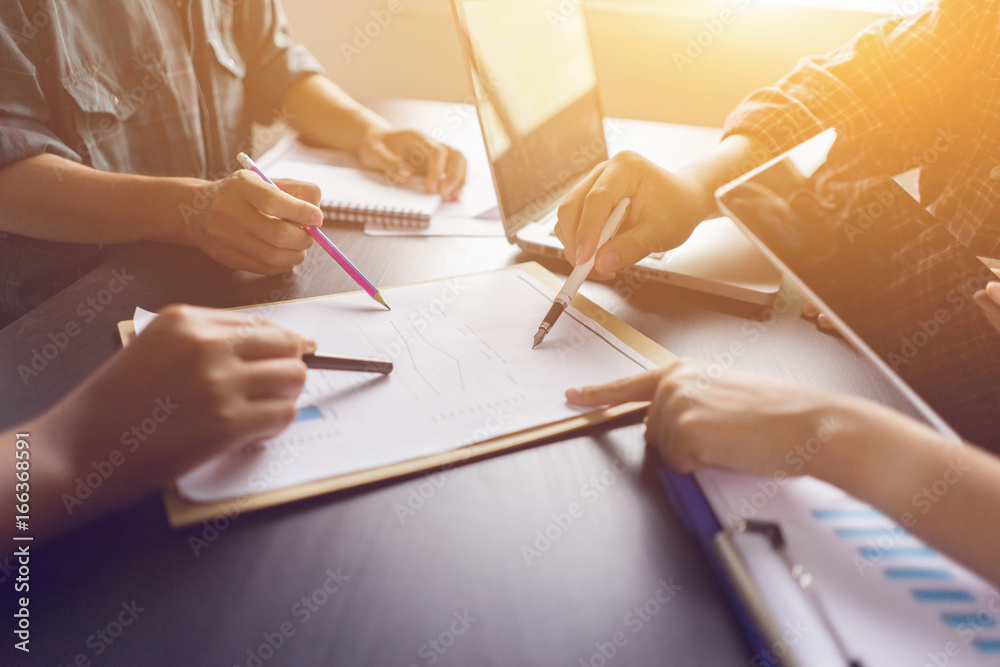 Young male and female Business group of colleagues drawing graphic ...