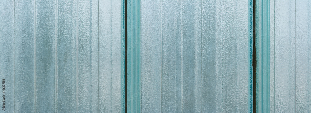Opaque striped glass wall blocks. Architecture detail. Wide-angle ...