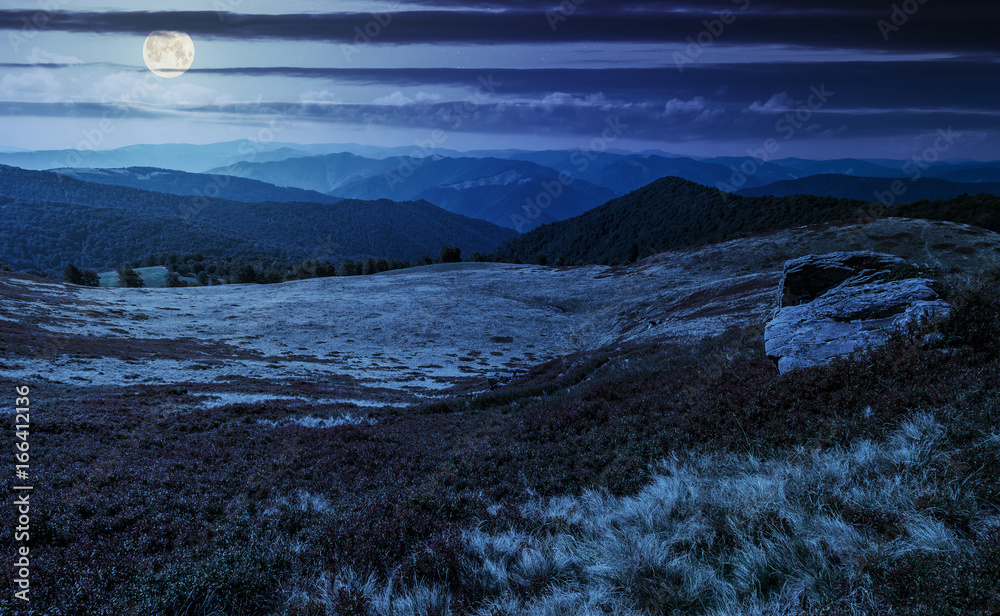 huge boulders on the edge of hillside at night Stock Photo | Adobe Stock