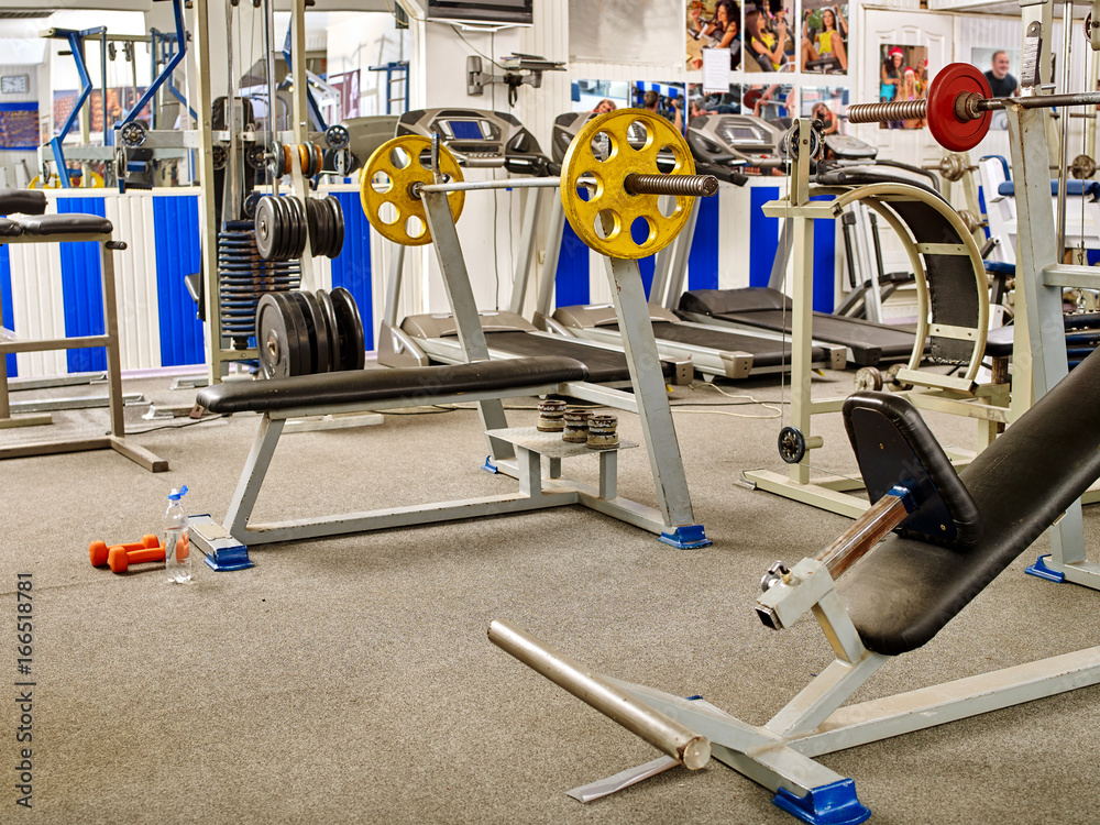 Fitness Room with jogging treadmill and exercise machine. Group of ...