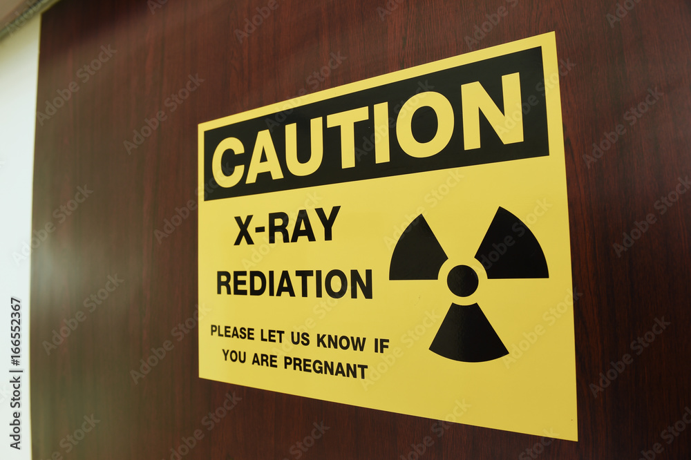 Symbol of radioactivity and radiation from x-ray machine Stock Photo ...