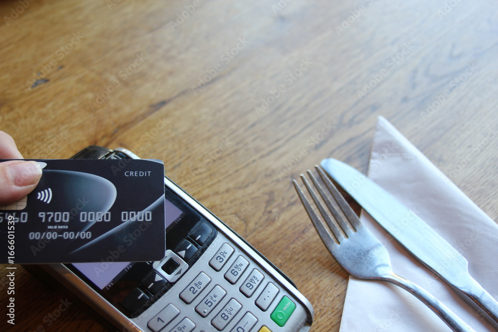 contactless payment card pdq background copy space with hand holding ...