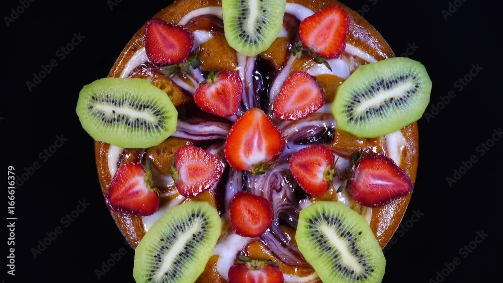 Excellent top-view close up of round pie with sliced fresh strawberries ...