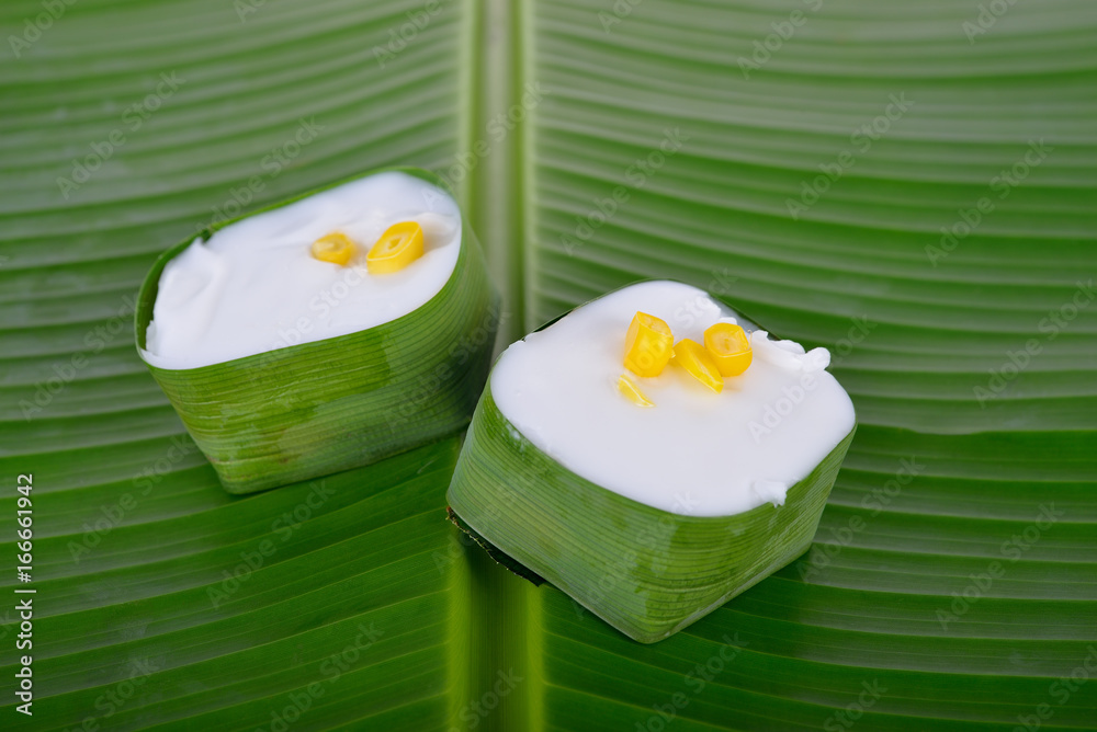 Authentic Thai Dessert Creamy Coconut Tapioca And Corn Pudding On Banana Leaf Background Stock
