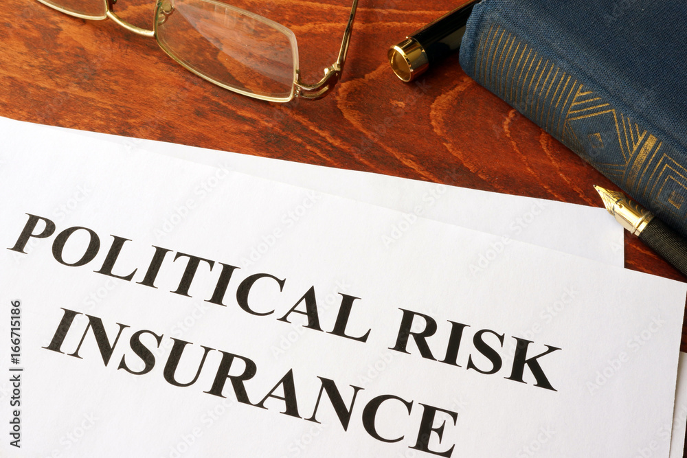 Political Risk Insurance policy on a table. Stock Photo | Adobe Stock