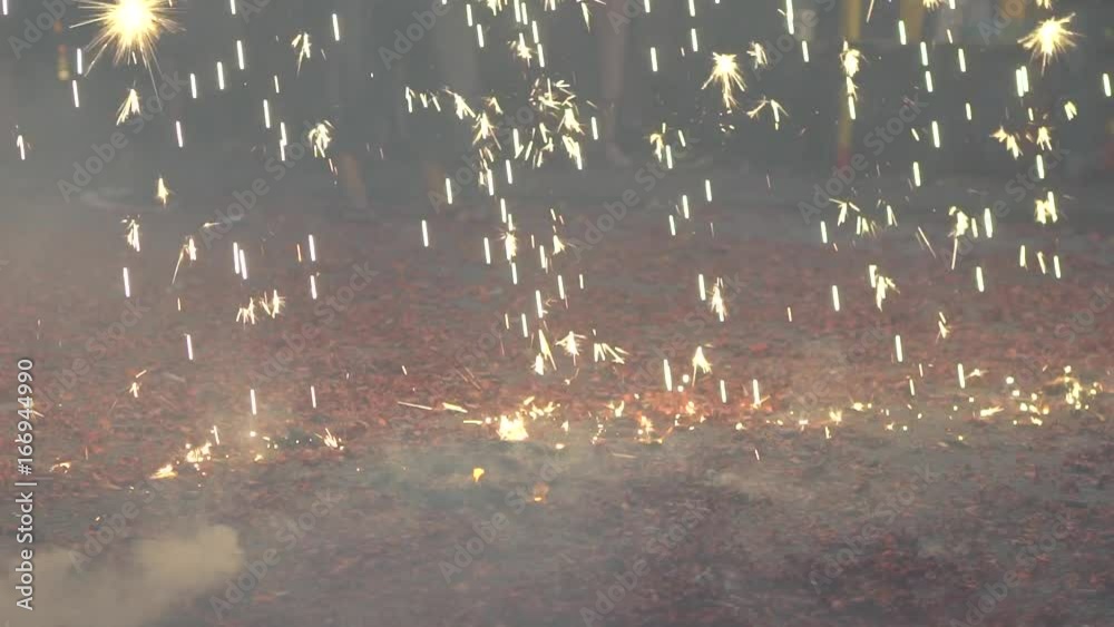 Slow motion Bright fire rain falling down in celebration of Matsu God ...