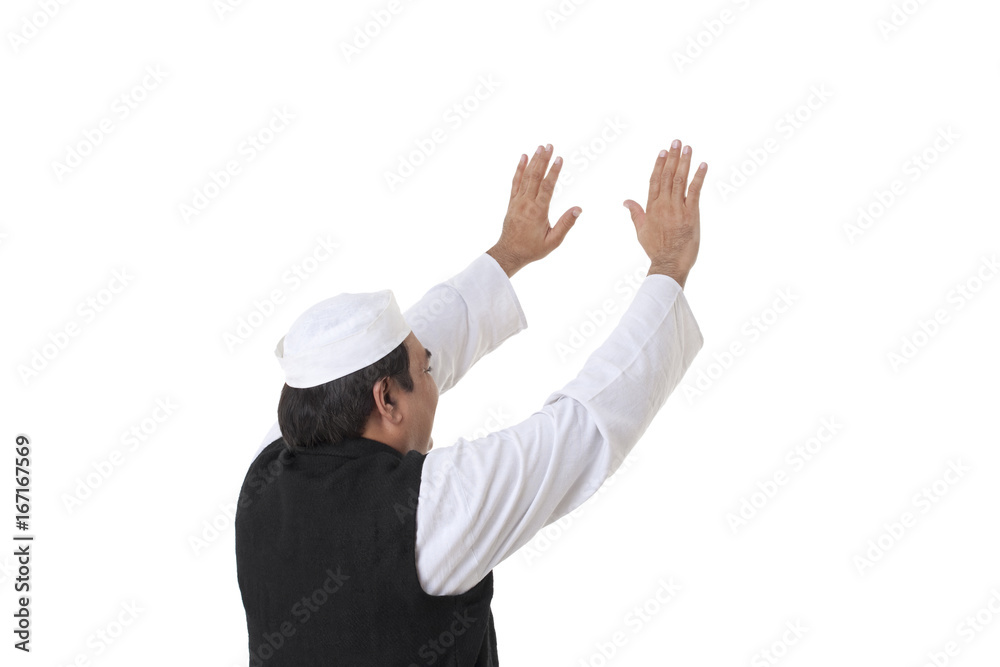 Back view of politician with raised hands Stock Photo | Adobe Stock