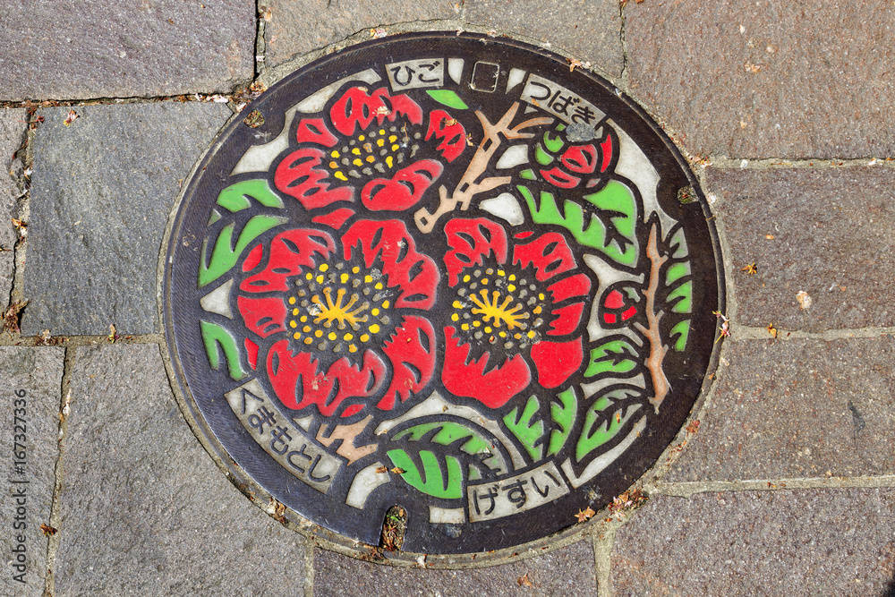 Painted manhole cover in the street at Kumamoto Stock Photo | Adobe Stock