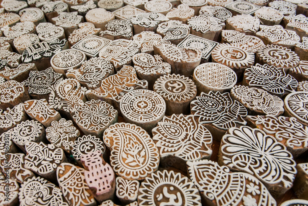 Texture of Indian patterned background. Om sign, leaf, branch of tree ...