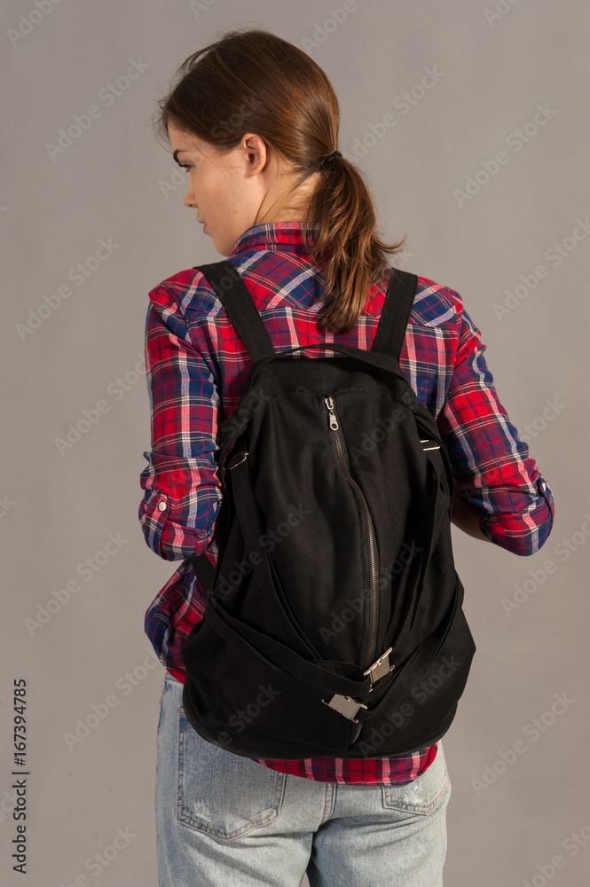 Young pretty ukrainian caucasian girl in lamberjack red and blue shirt ...