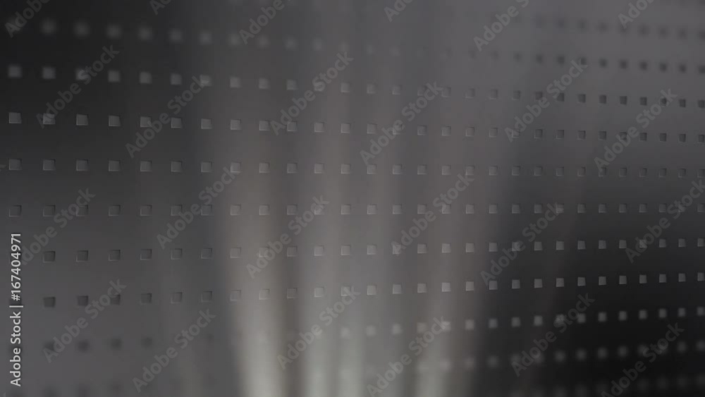 Perforated sheet metal with volumetric light. 4K UHD video loop ...