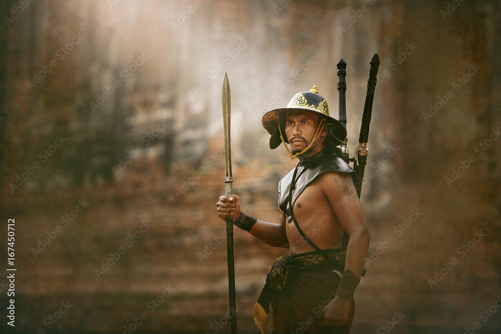 Ancient warrior man of soldier of Bang Rachan District Thailand hold ...