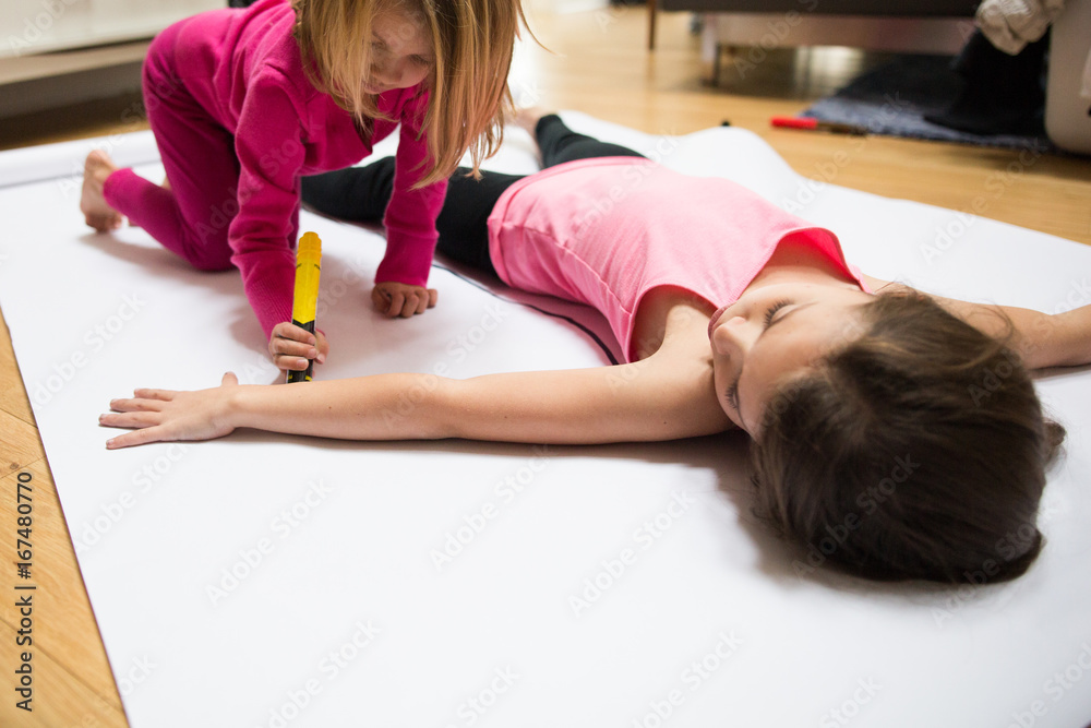 Girl body tracing outline on white paper Stock Photo | Adobe Stock