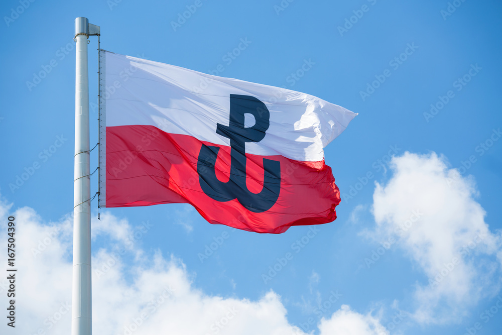 Polish flag with the symbol of Polish Fighting. Symbol of the Warsaw ...