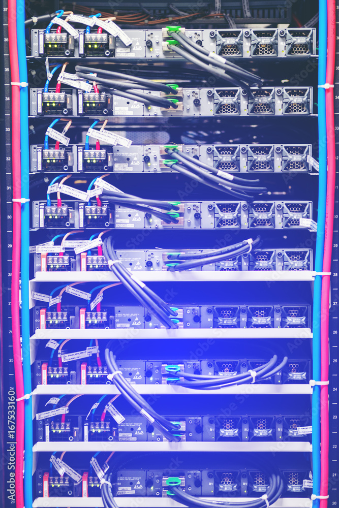 Back panel of powerful servers installed in the rack of the server room ...
