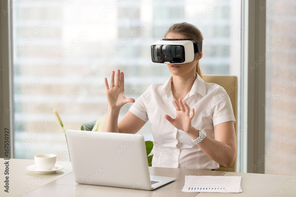 VR headset in use, businesswoman wearing virtual reality glasses for ...