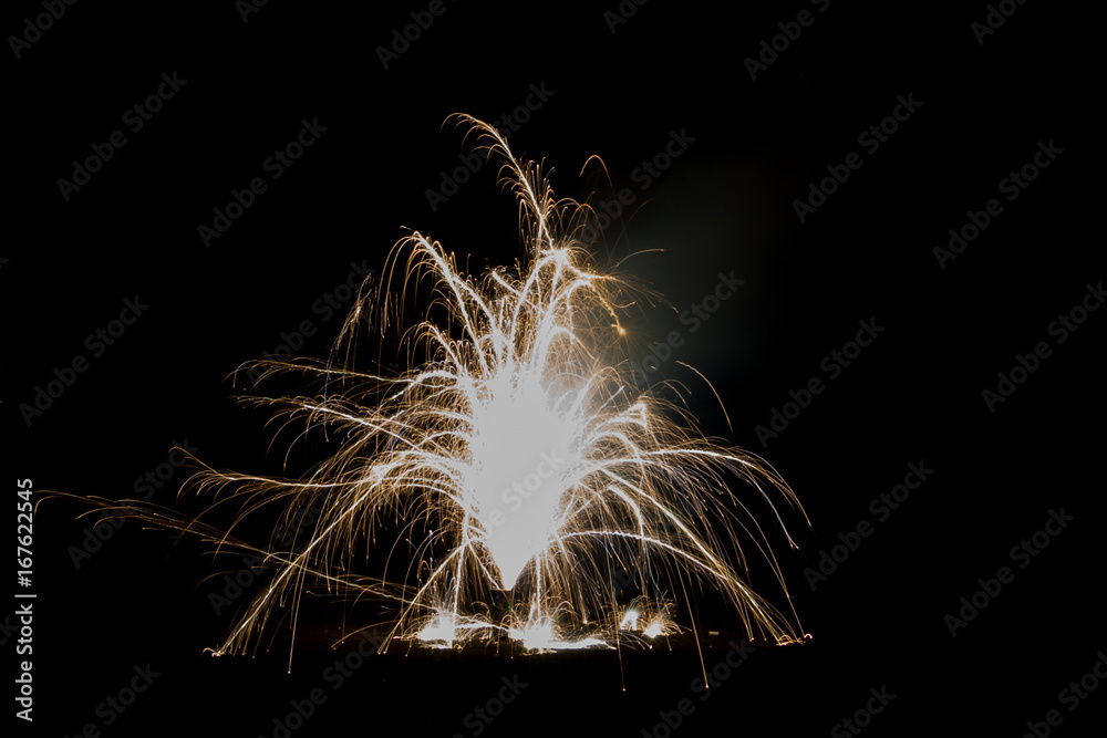 Showering sparks light show from ground fireworks fountain Stock Photo ...