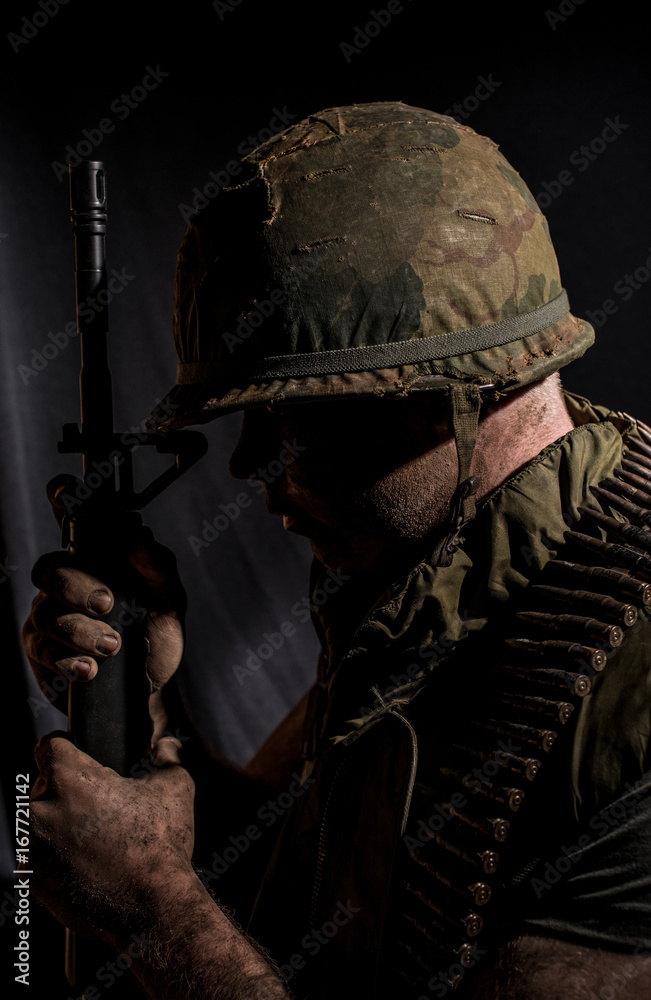 Foto de US Marine (Vietnam War) in profile with face in shadow and ...