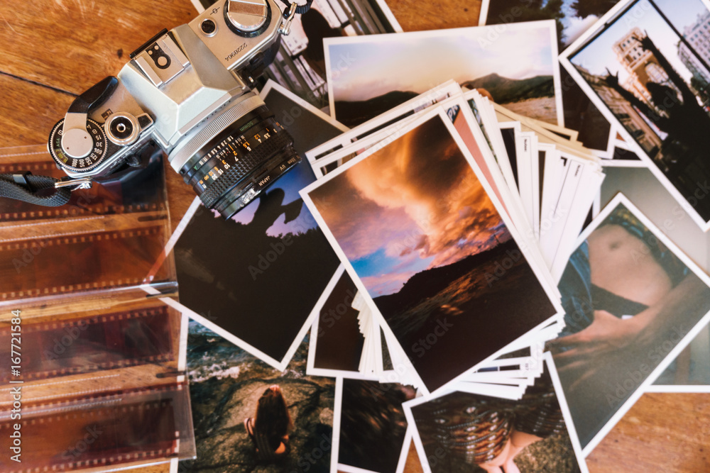 Printed photos and camera Stock Photo | Adobe Stock