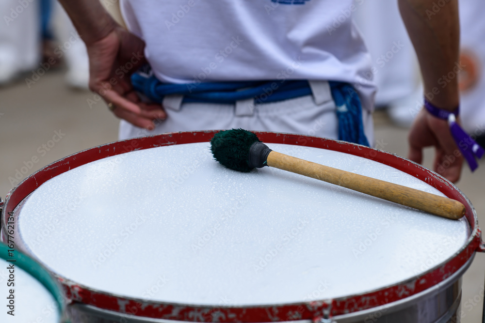 close-up drum and drum sticks, outdoors. Traditional musical instrument ...