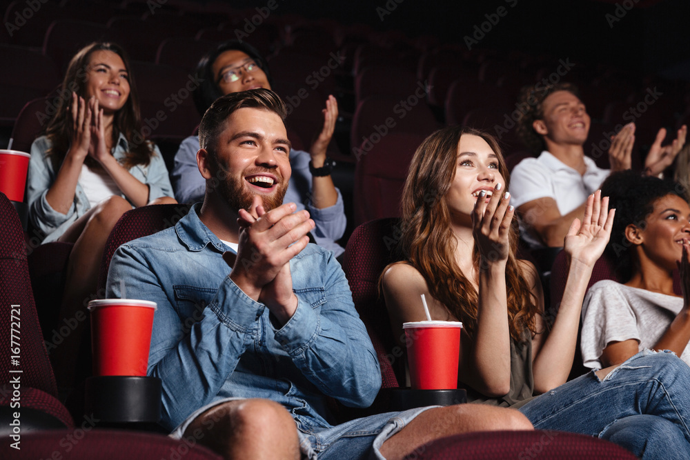 Happy smiling audience clapping hands Stock Photo | Adobe Stock
