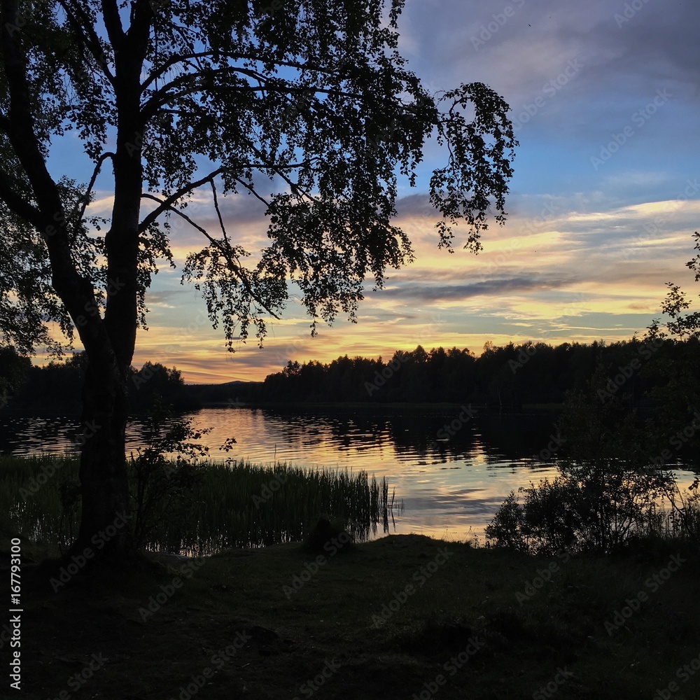 Sunset at Ore river at Orsa in Sweden Stock Photo | Adobe Stock