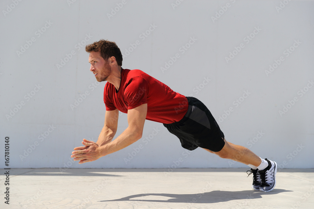 Clap pushup fitness man doing plyometrics push-up explosive workout for ...