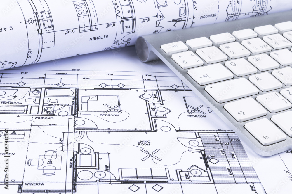 Architectural blueprints drawings of the modern house with computer ...