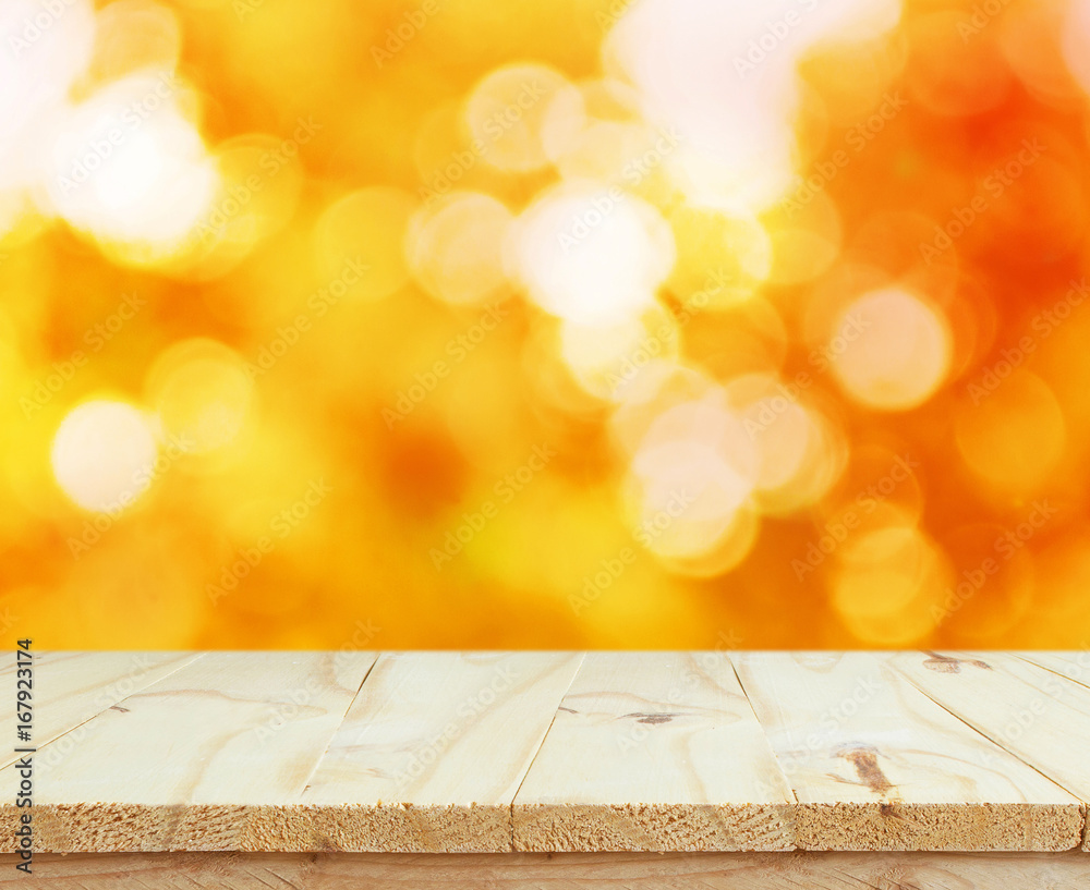 Wood table top on shiny bokeh gold background for display your products ...