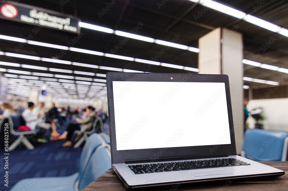 laptop computer with white blank screen for presentation on wooden desk ...