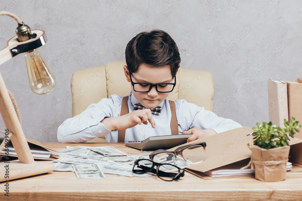kid using calculator Stock Photo | Adobe Stock